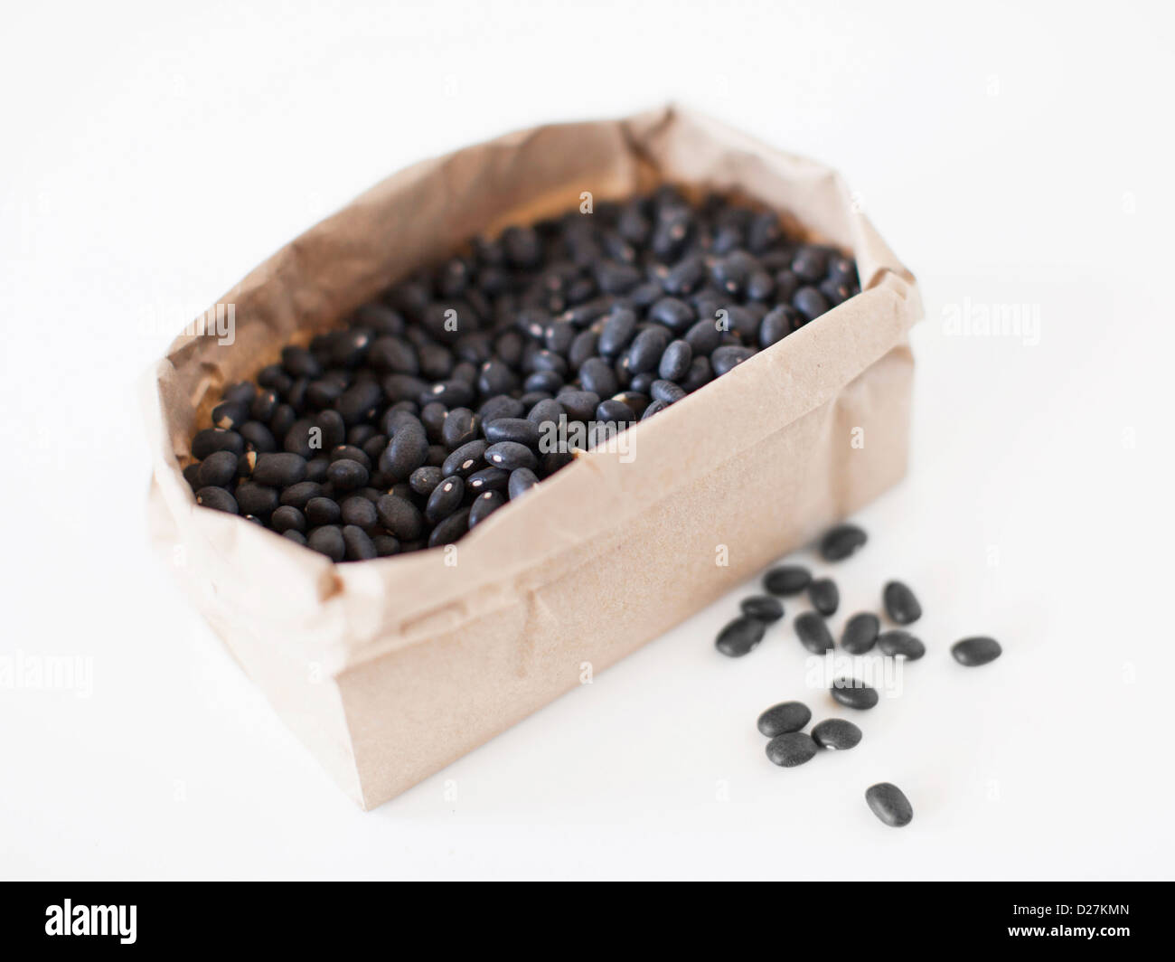Carton of beans on white background Stock Photo - Alamy