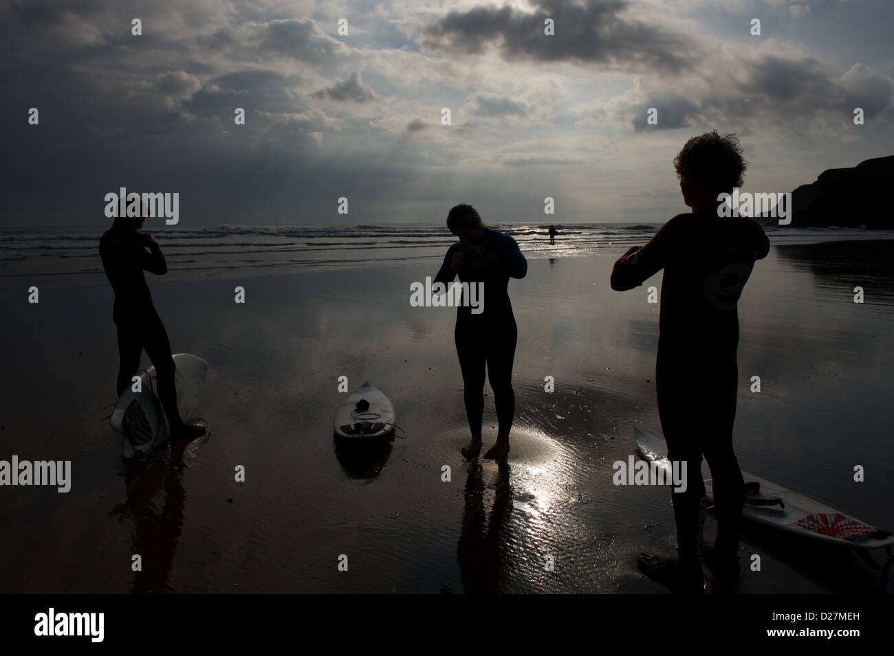 Three surfers hi-res stock photography and images - Alamy