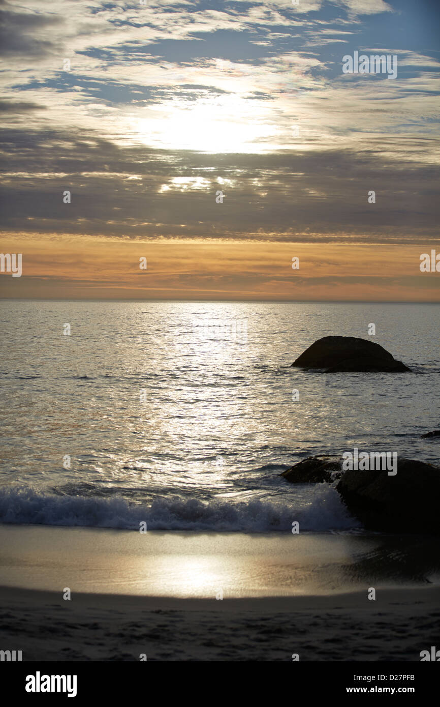 Dramatic setting sun over the sea Stock Photo - Alamy