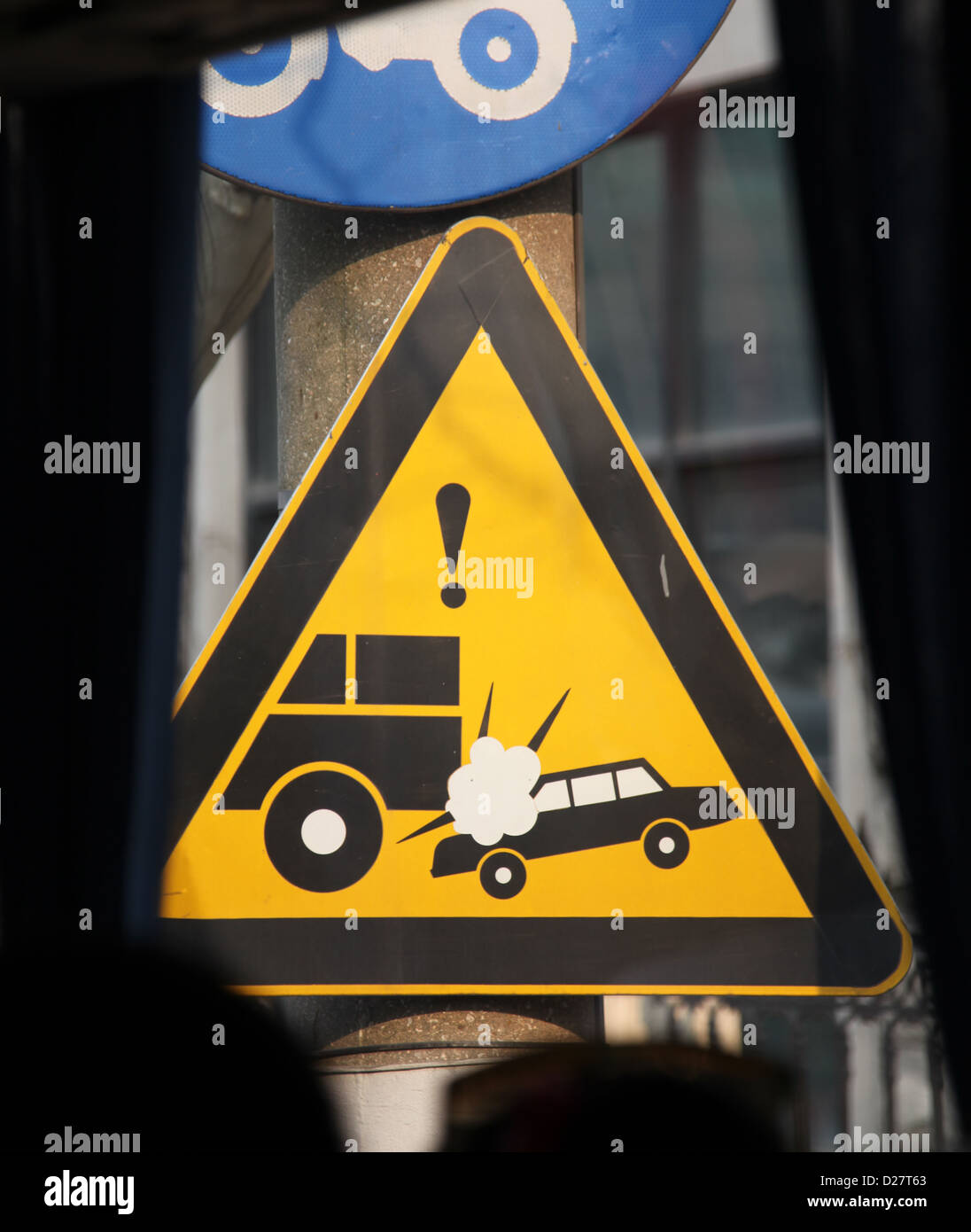 It's a photo of a road sign in yellow and black to tell to care of ...