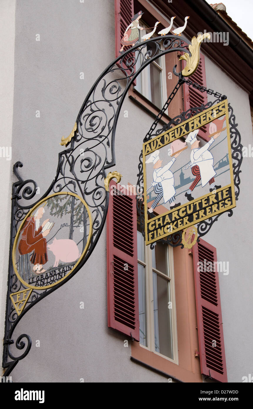 France, Alsace, Colmar. Traditional butcher shop wrought-iron store ...