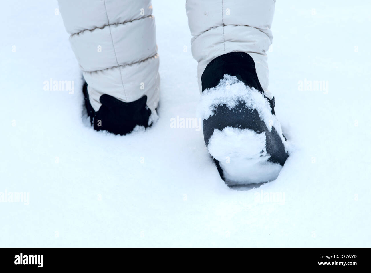 snowboots in the winter snow Stock Photo - Alamy