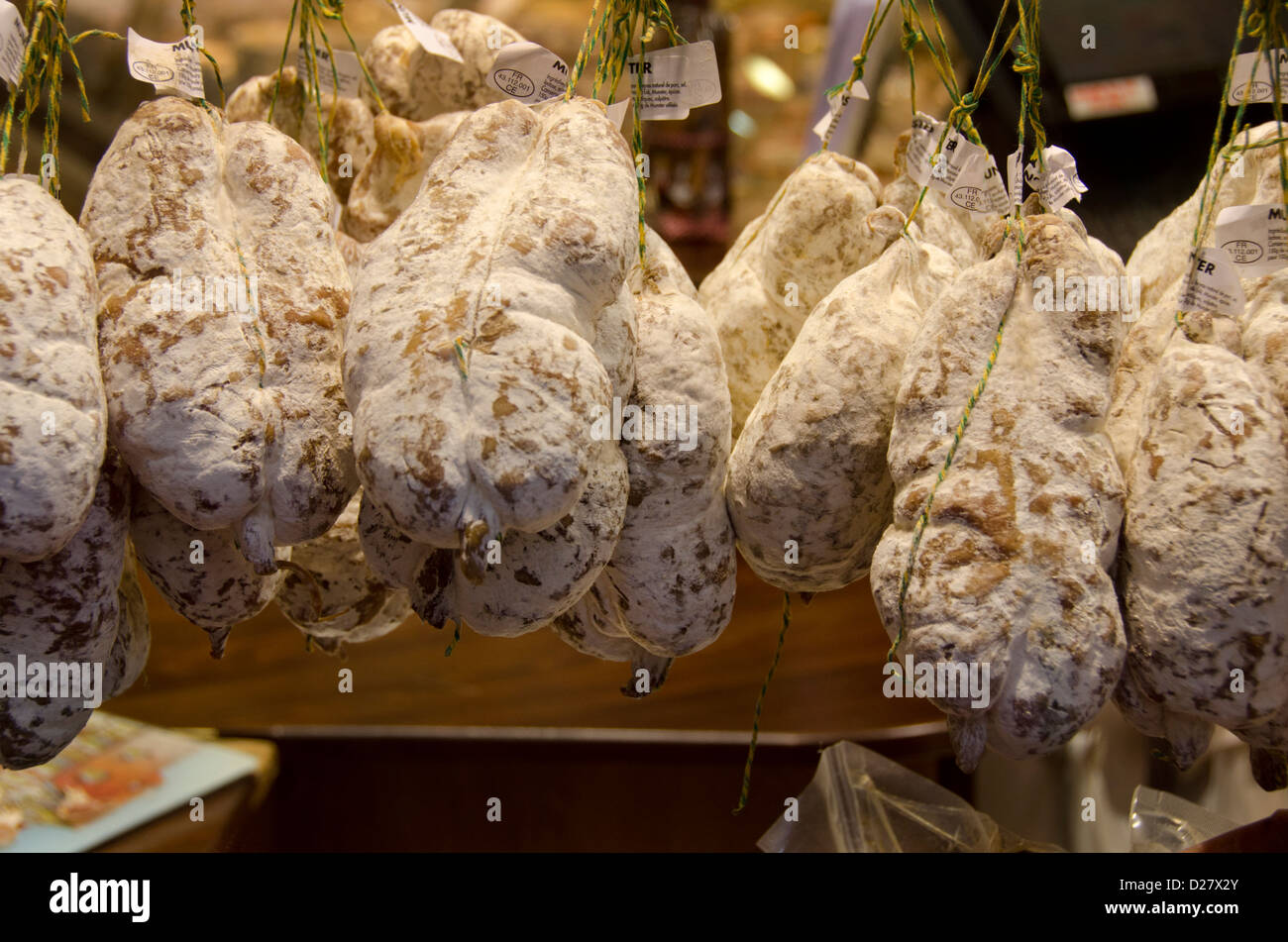 France, Alsace, Colmar. Meat hanging in butcher shop window Stock Photo ...