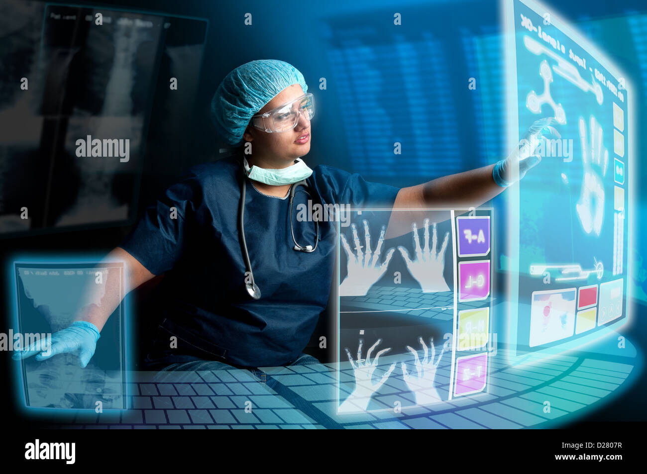 Doctor in uniform with X-rays and digital screens and keyboard Stock ...