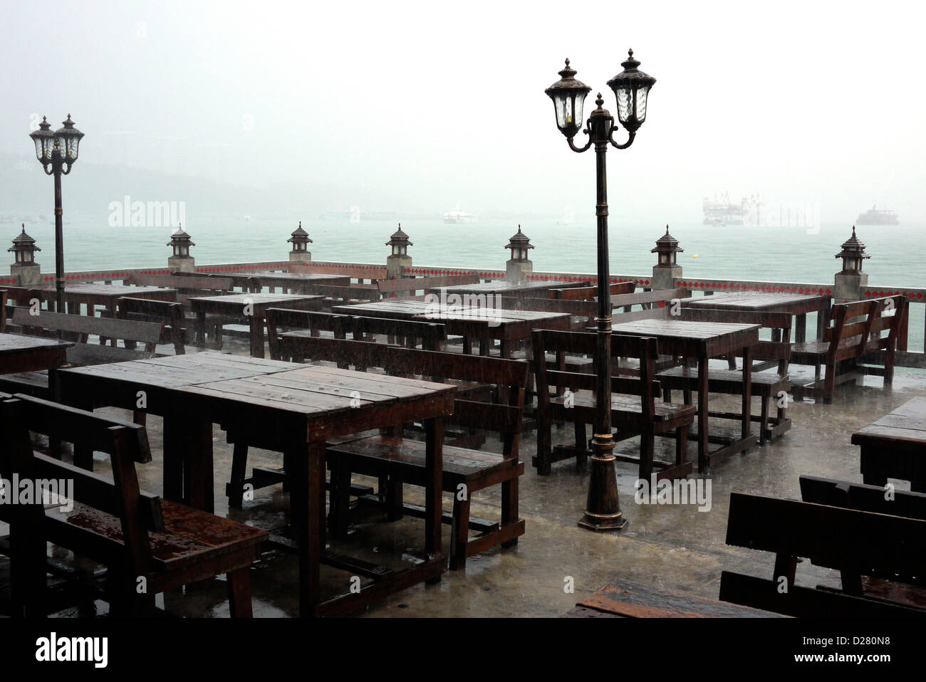 Heavy rain at an outdoor bar restaurant known as the "Beer Garden" in ...