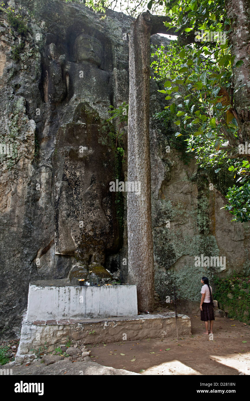 Buddha statue carved into the rock. Dowa temple. Near Ella. Sri Lanka ...