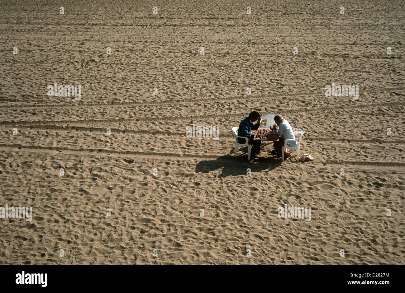 Two men playing chess on beach, Barcelona, Spain, chess players Stock ...