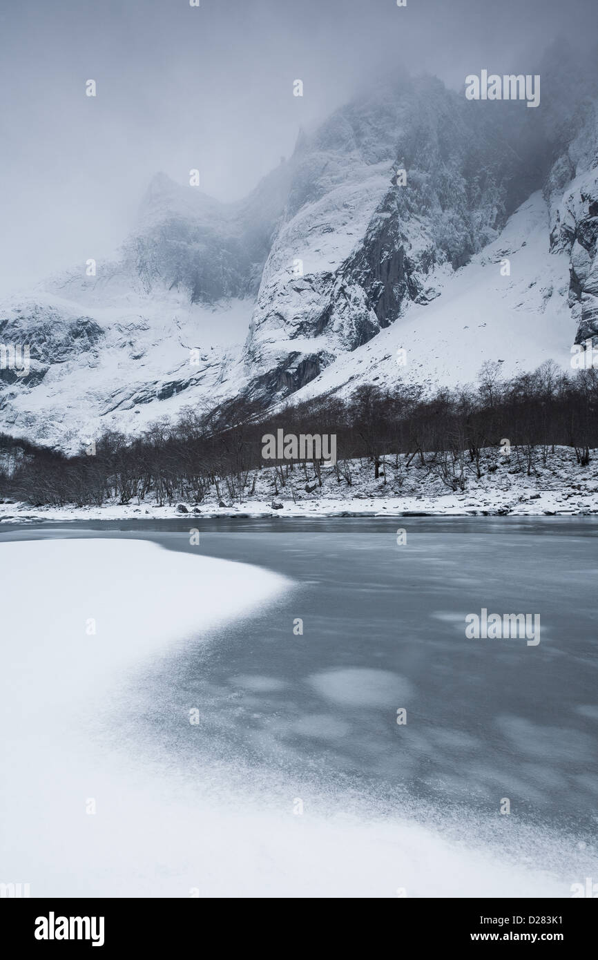 Winter in the Romsdalen valley, Norway. River Rauma in the foreground ...