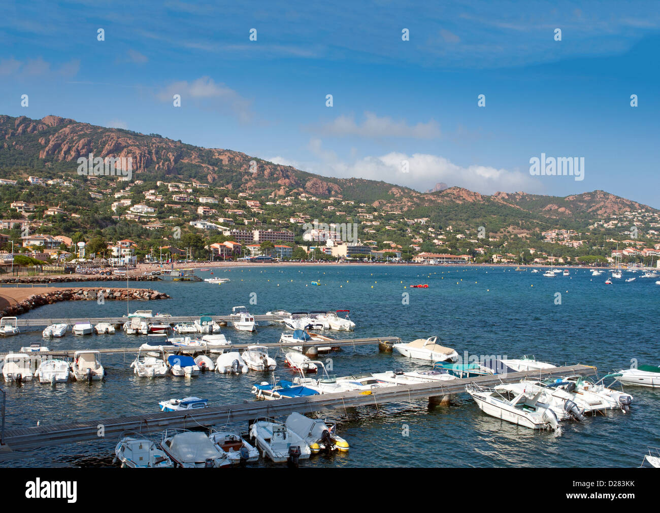 A marina near Agay, Var, Provence, France, with the Esterel Corniche in ...