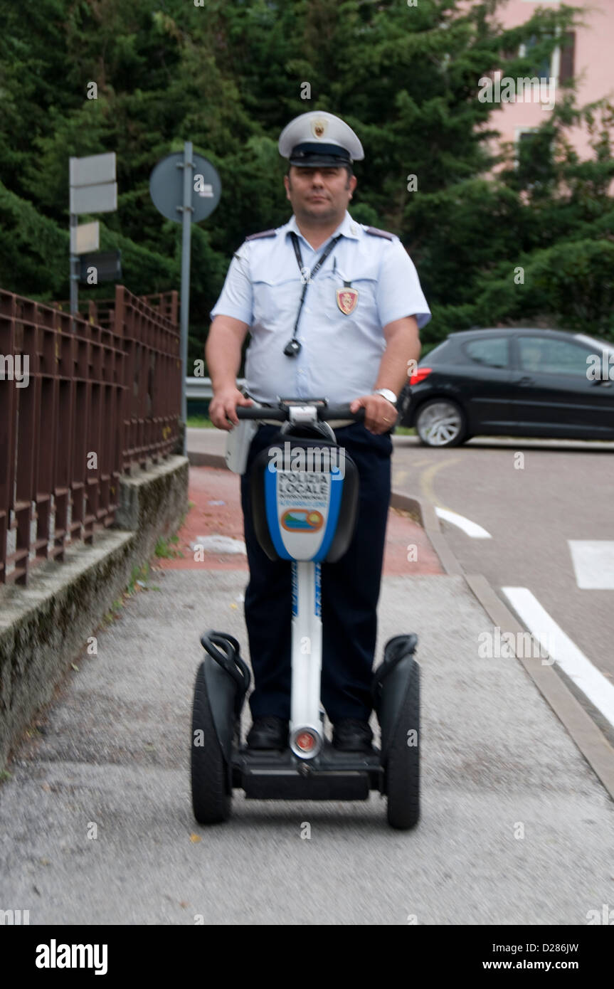 An Italian Police officer on duty using a Segway in Riva on the ...