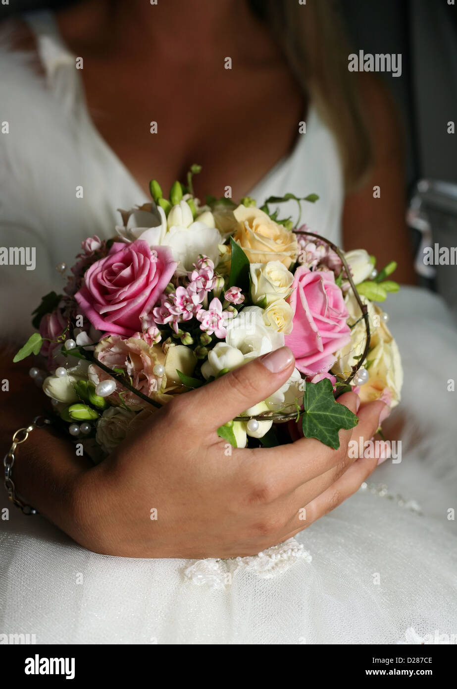 The bride holds a wedding bouquet Stock Photo - Alamy