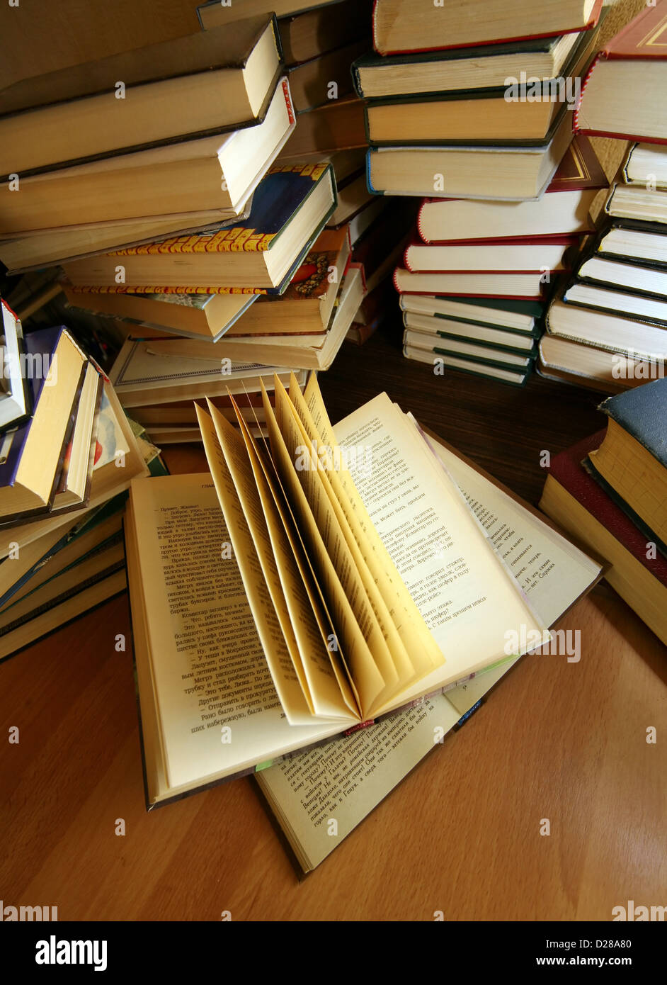 Many old books combined by a heap Stock Photo - Alamy