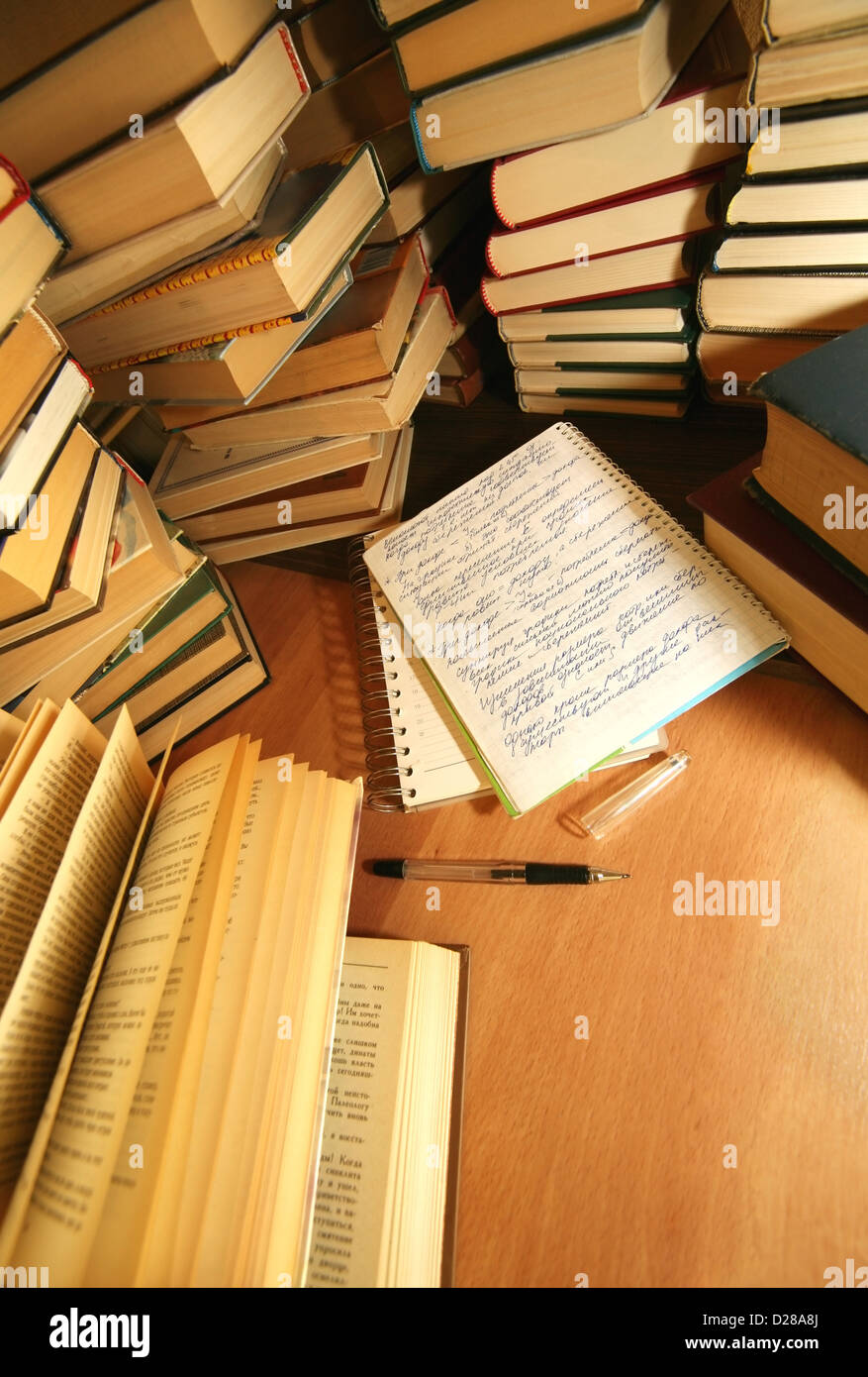 Many old books combined by a heap Stock Photo - Alamy