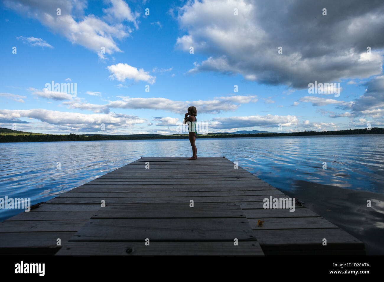 Woman and girl in swimsuit, on a dock hi-res stock photography and ...