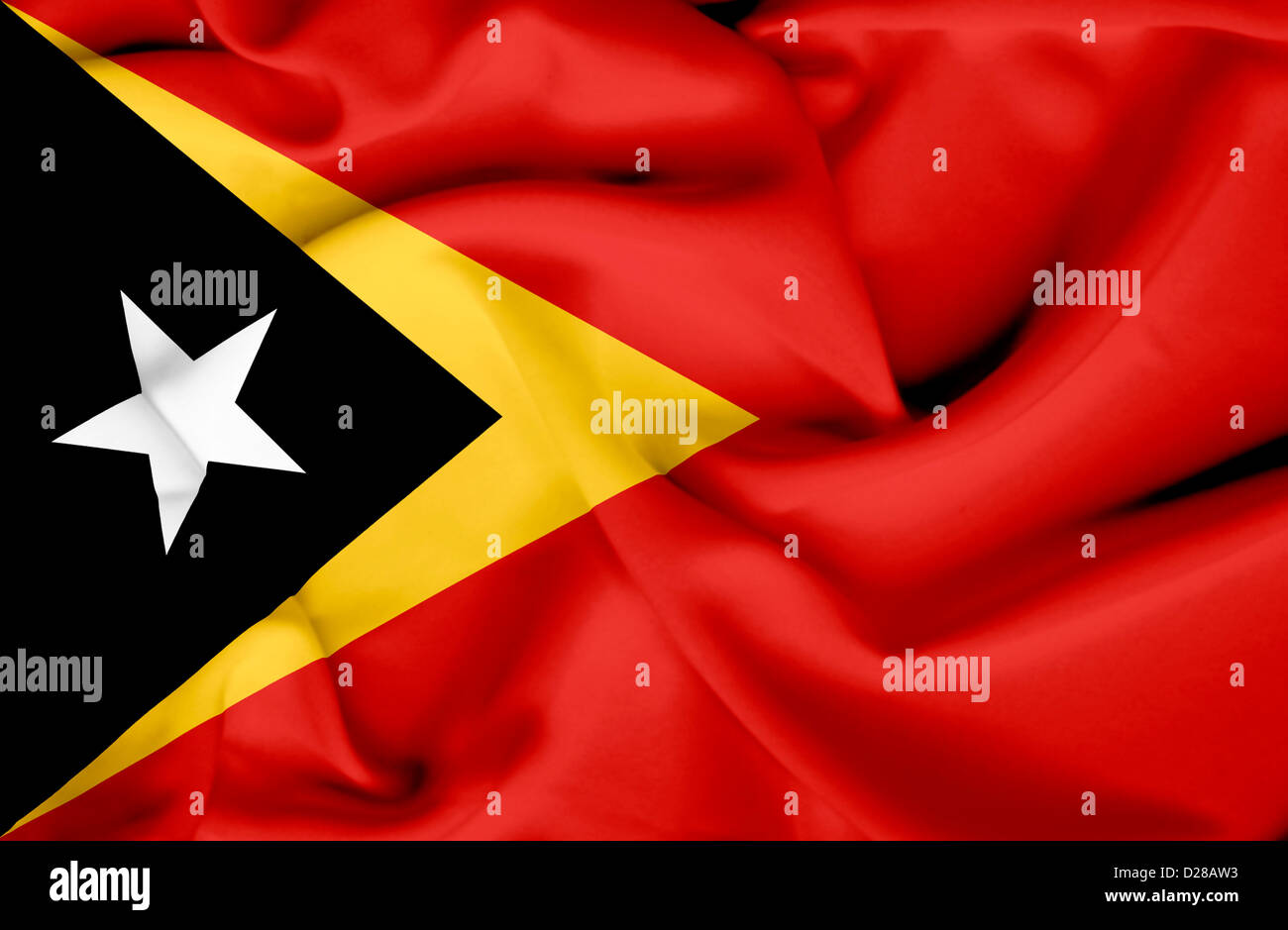 East Timor waving flag Stock Photo - Alamy
