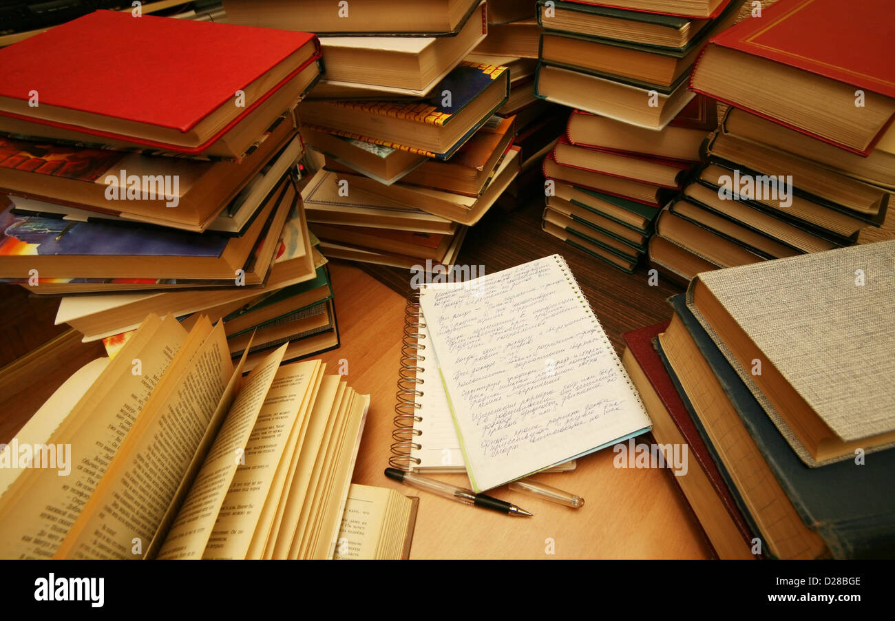 Many old books combined by a heap Stock Photo - Alamy