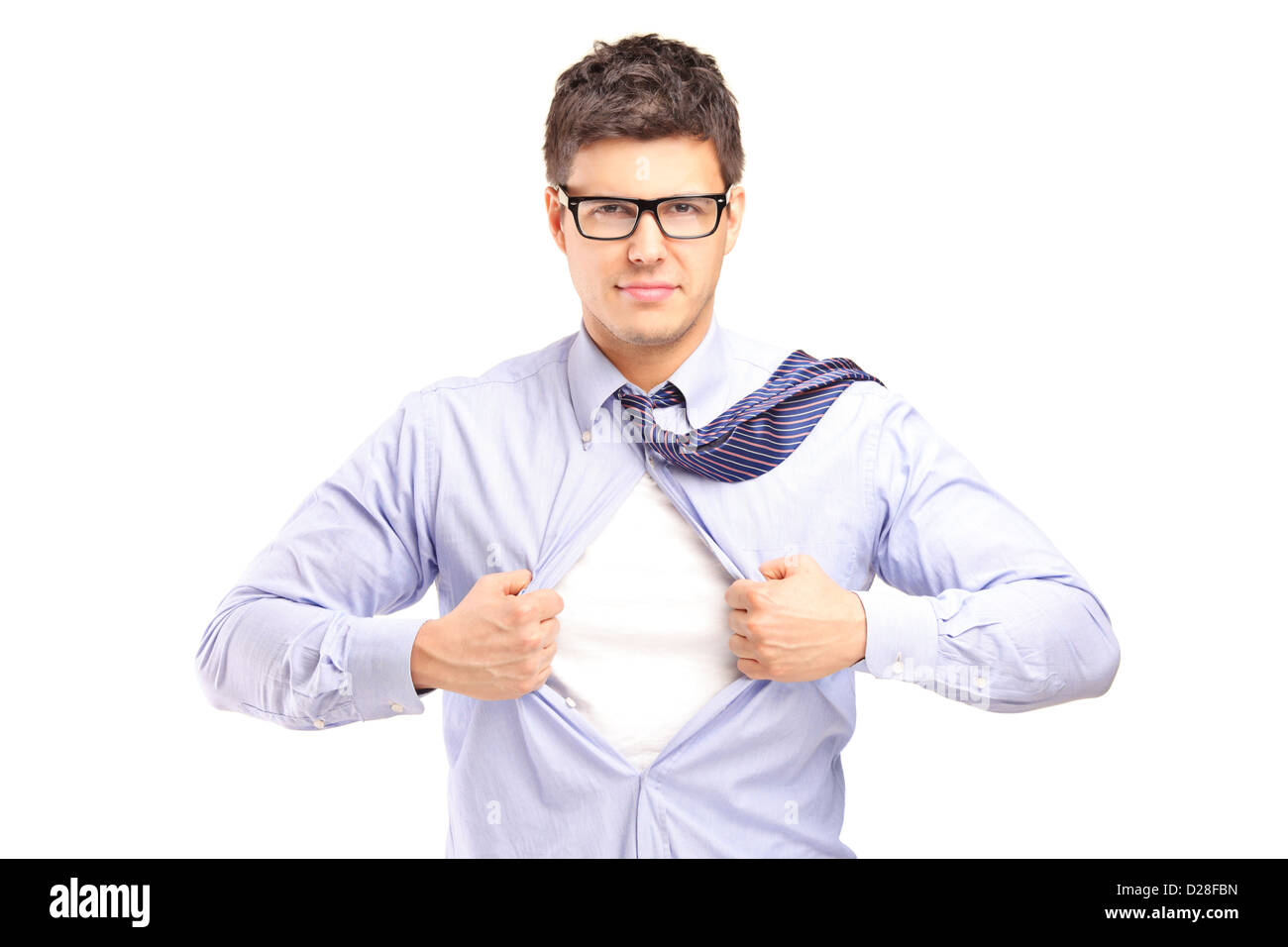 Young handsome man tearing off his shirt, isolated on white background ...