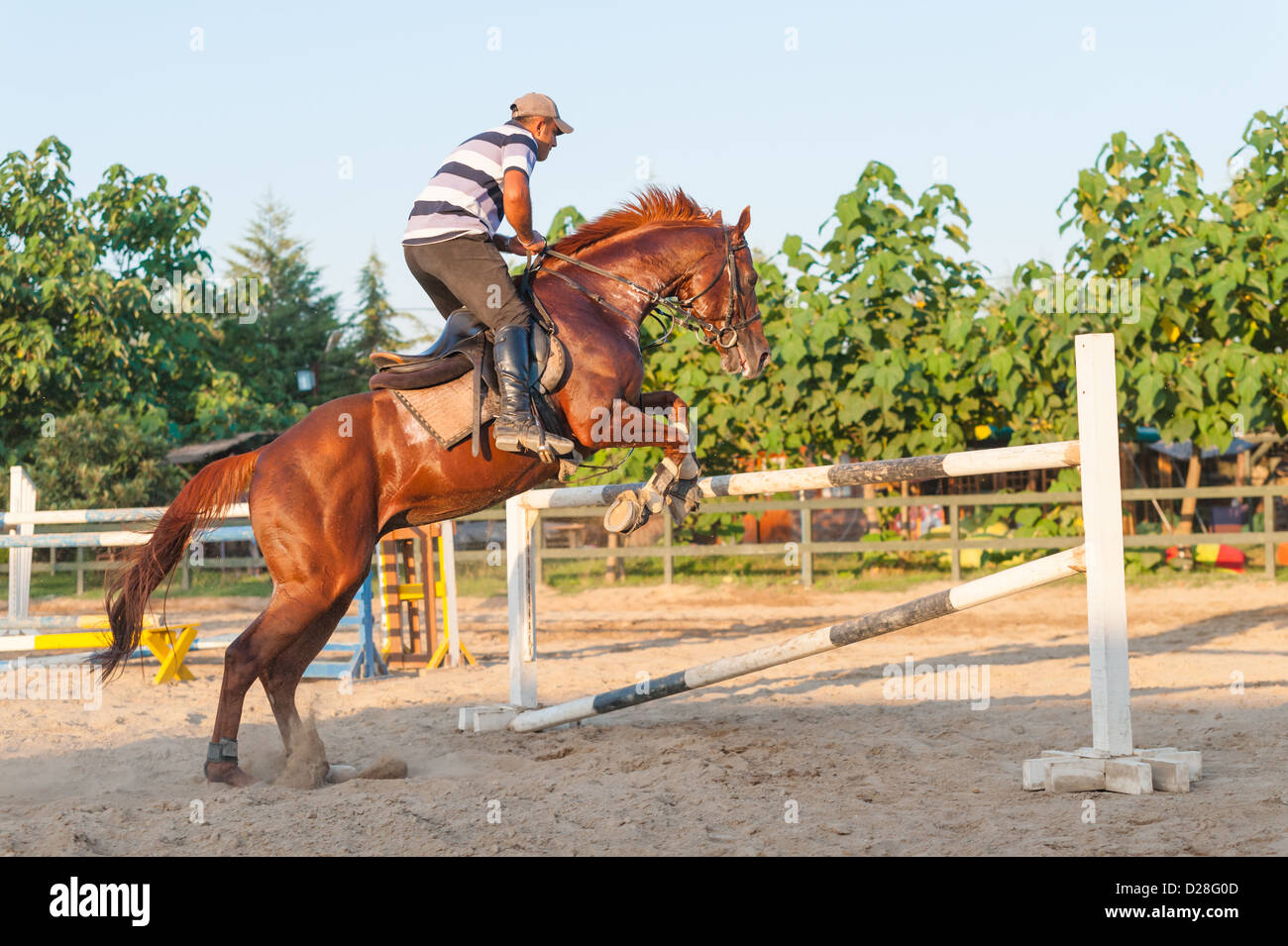 Jumping over the bar hi-res stock photography and images - Alamy