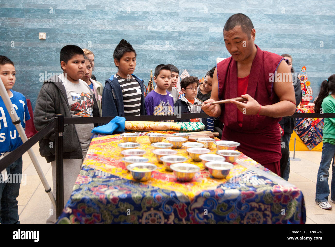 Tibetan Buddhist monks from the Drepung Loseling Monastery, construct ...