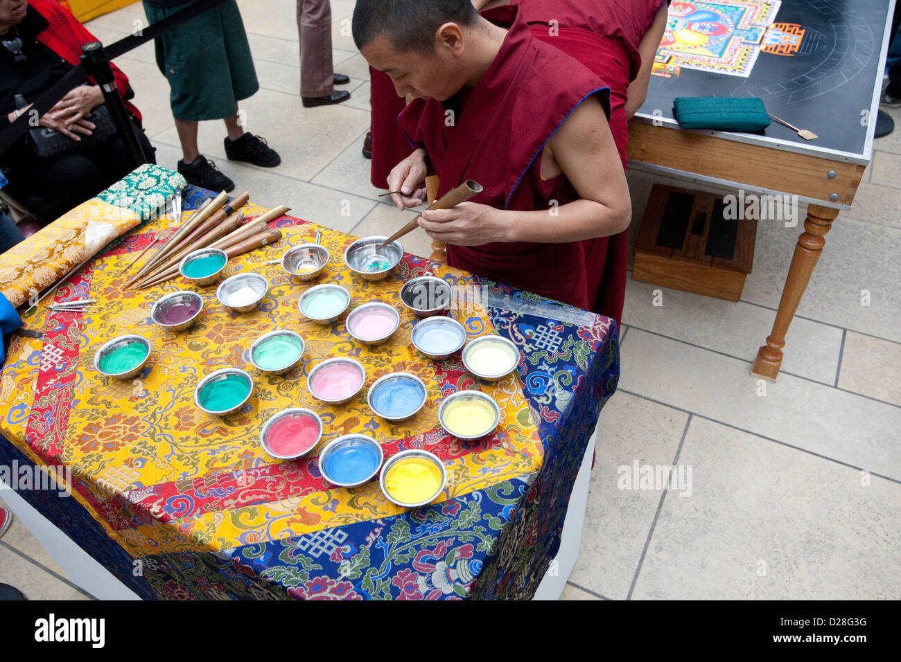 Tibetan Buddhist monks from the Drepung Loseling Monastery, construct ...