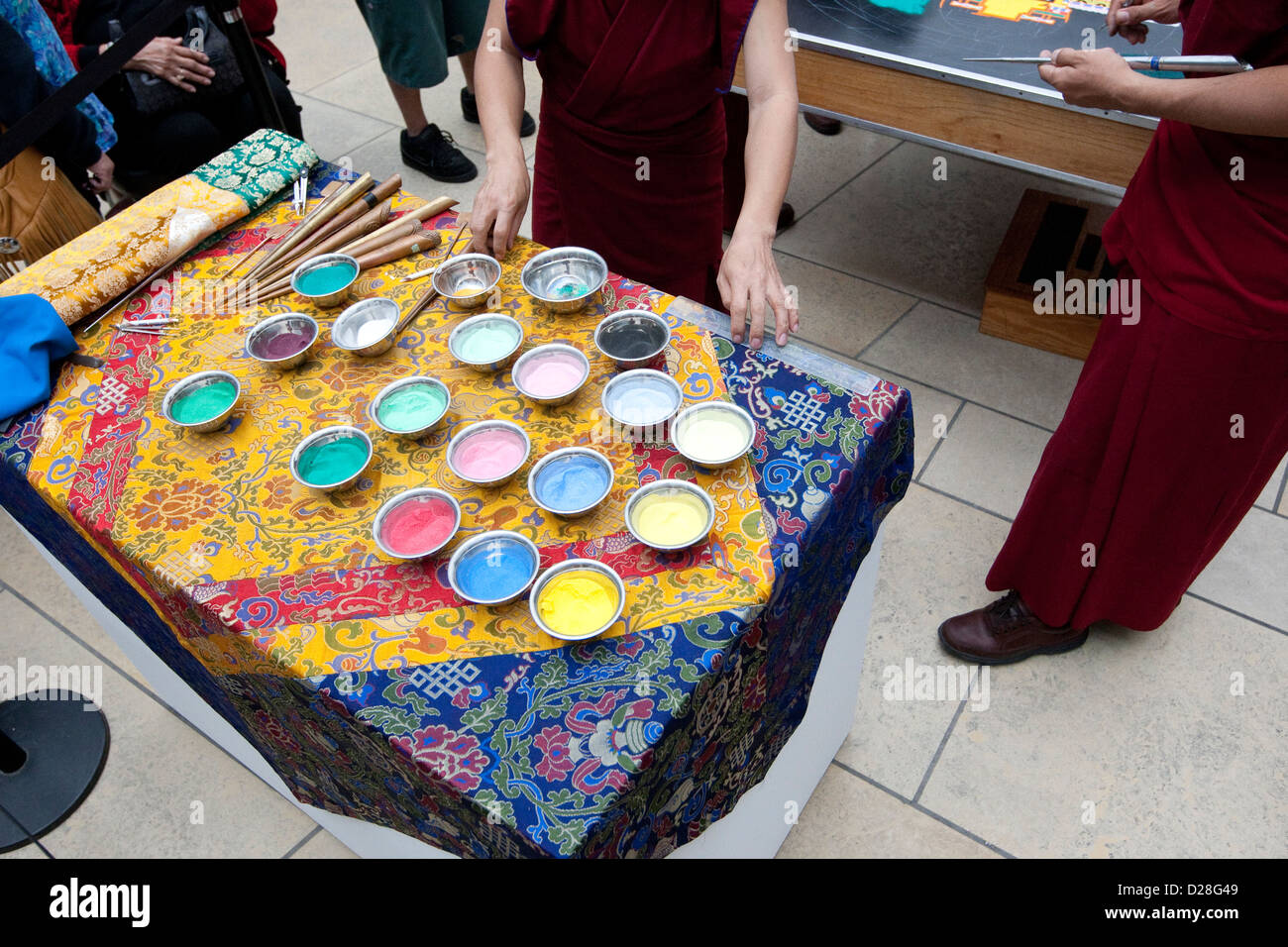 Tibetan Buddhist monks from the Drepung Loseling Monastery, construct ...