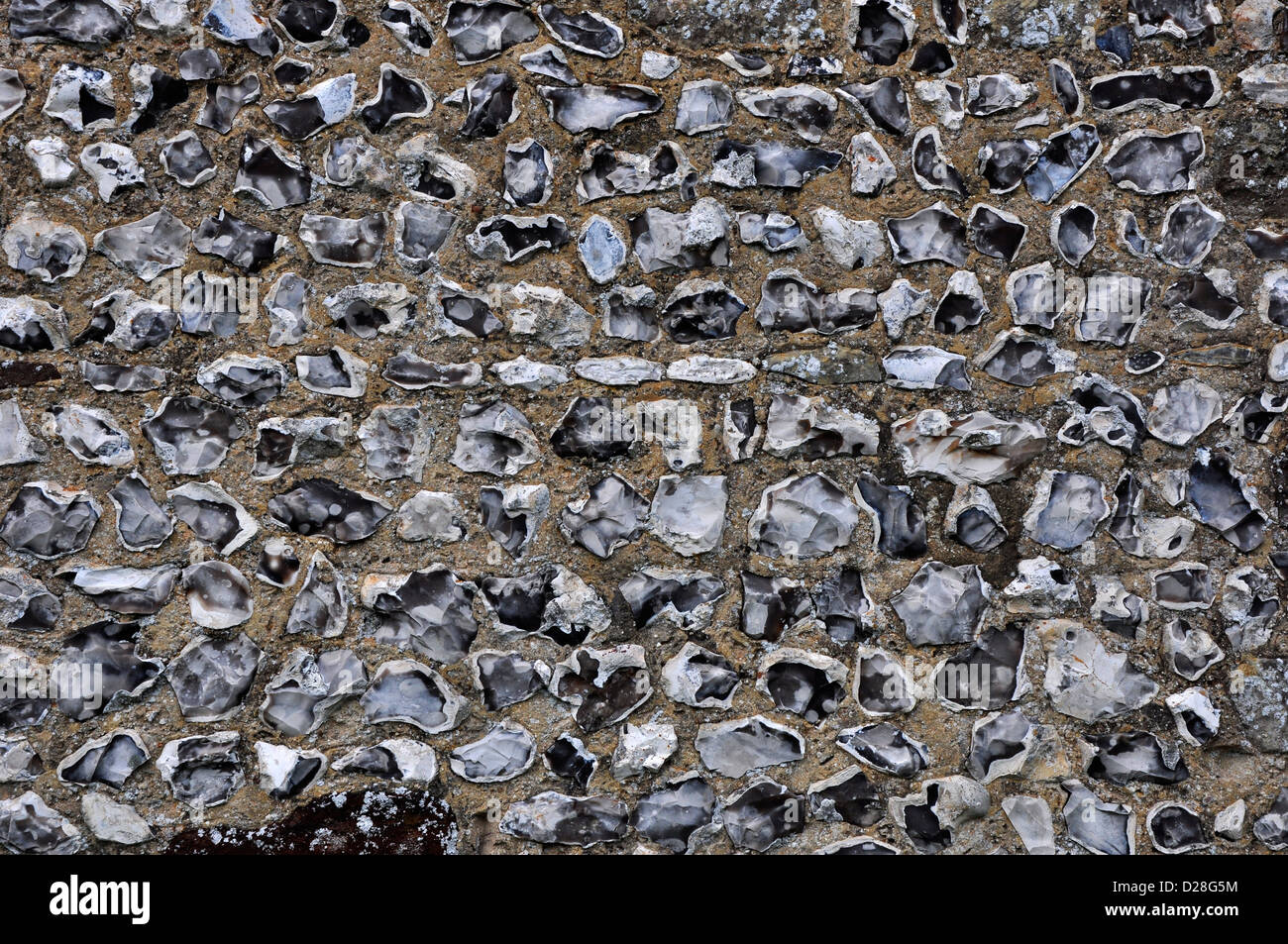 flint stone wall lime mortar stonework Stock Photo - Alamy