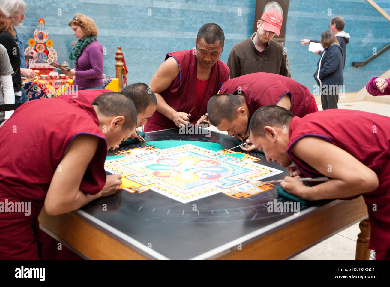 Tibetan Buddhist monks from the Drepung Loseling Monastery, construct ...