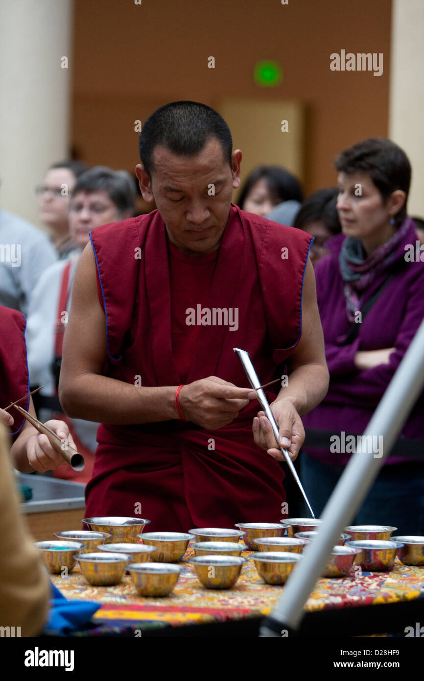 Tibetan Buddhist monks from the Drepung Loseling Monastery, construct ...