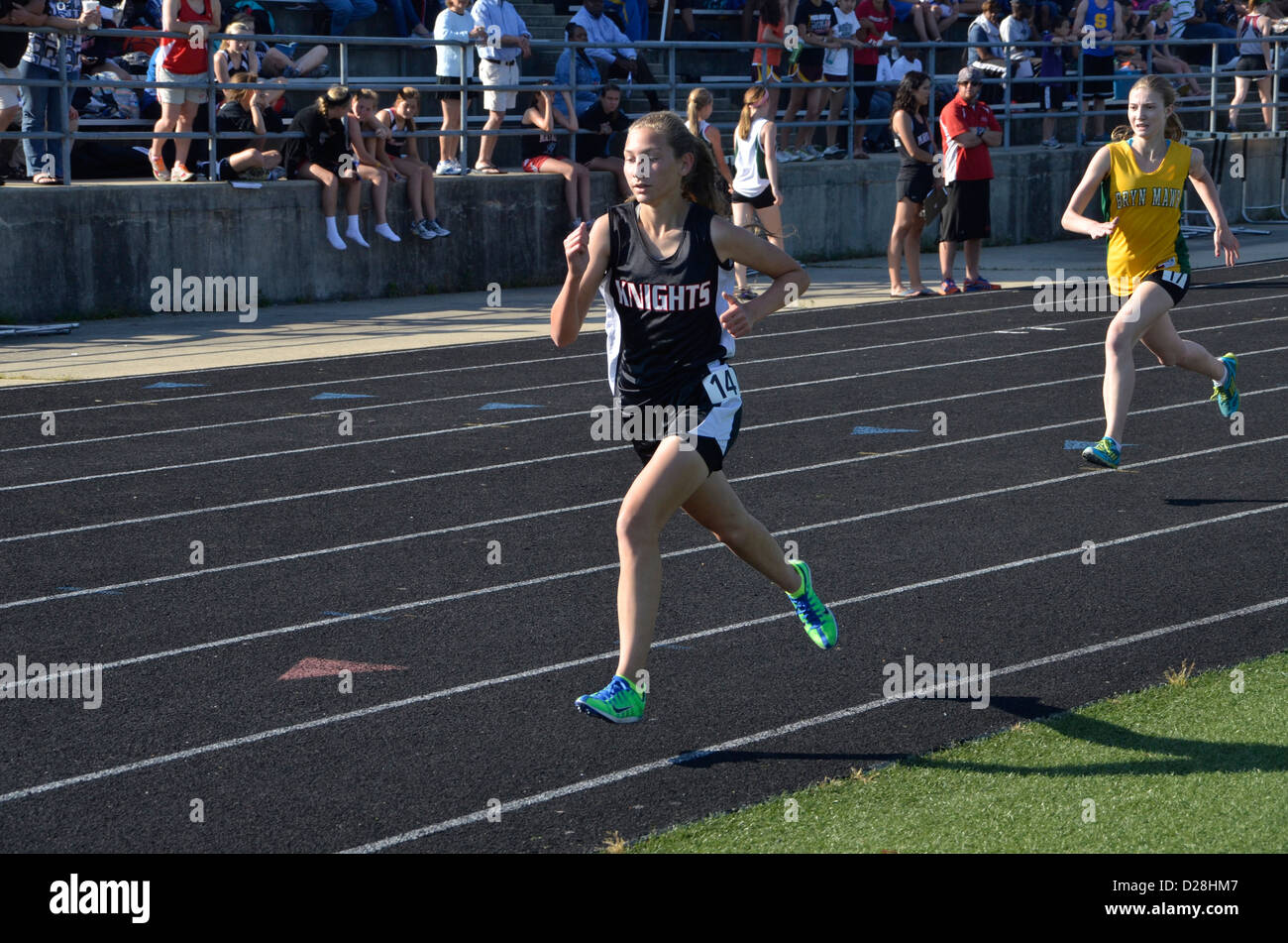 Runners in a high school track meet Stock Photo - Alamy