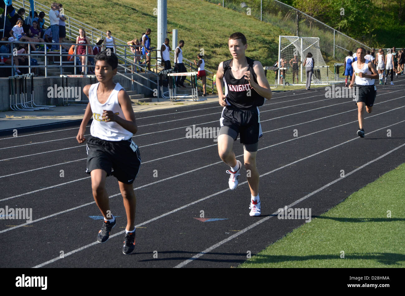Runners in a high school track meet Stock Photo - Alamy