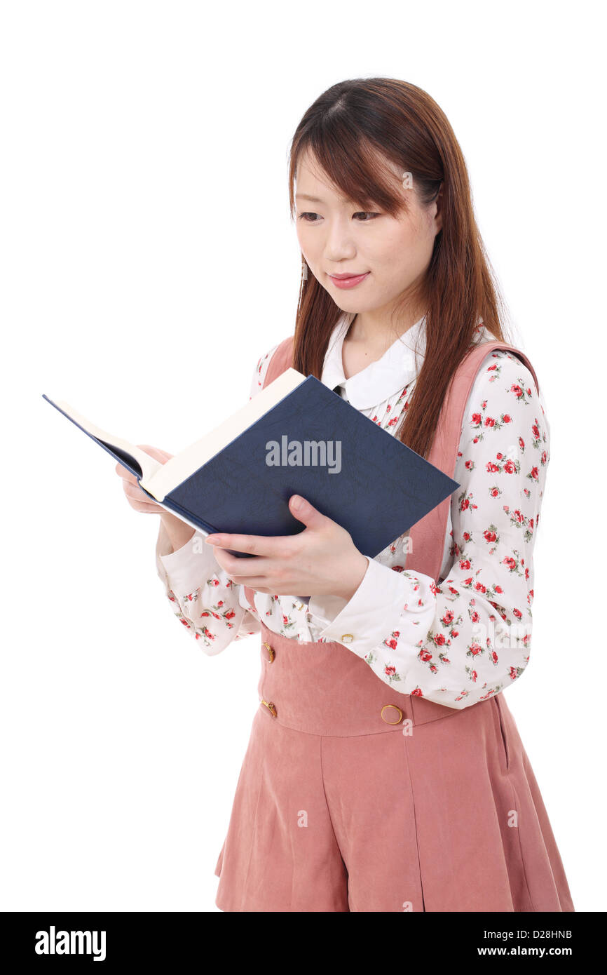 Young asian woman reading book Stock Photo - Alamy