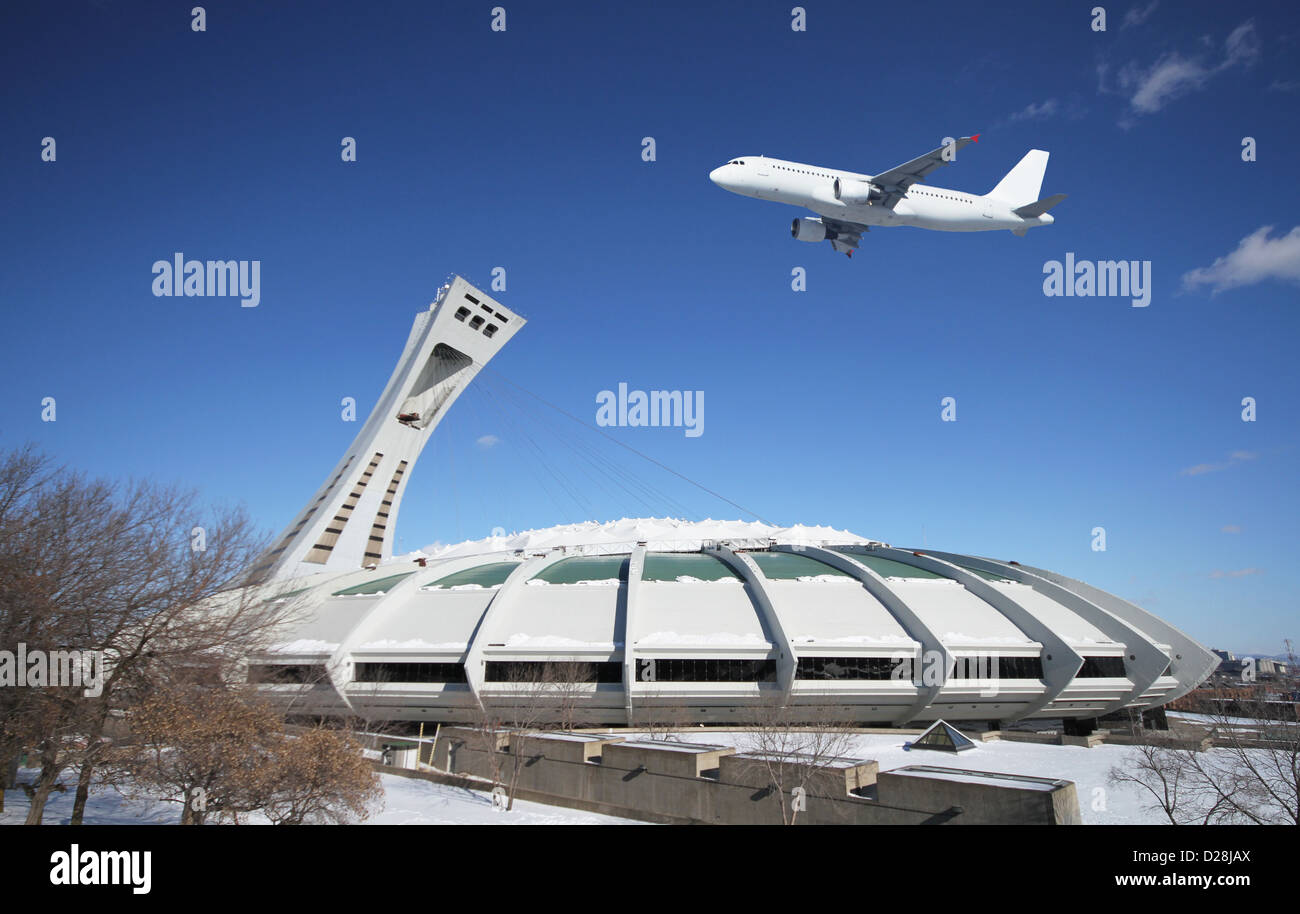 Airplane over the Olympic Stadium, city of Montreal, Canada Stock Photo ...