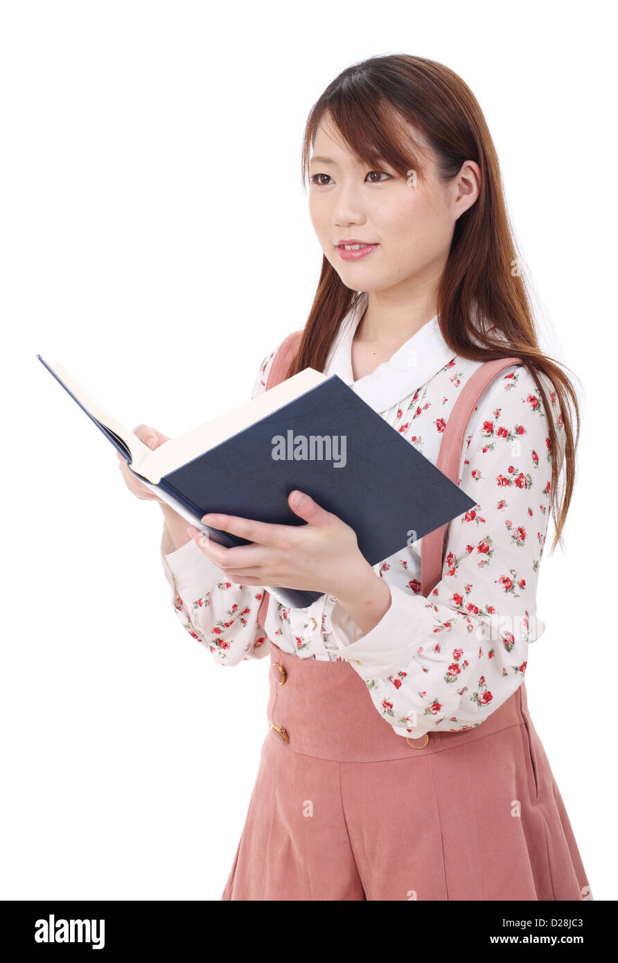 Young asian woman reading book Stock Photo - Alamy