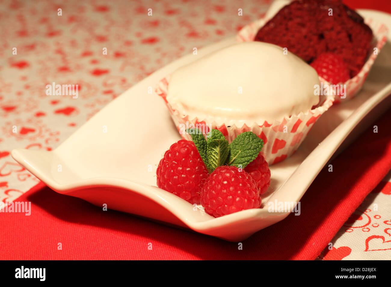 Valentine's desert-Muffins with raspberry Stock Photo - Alamy