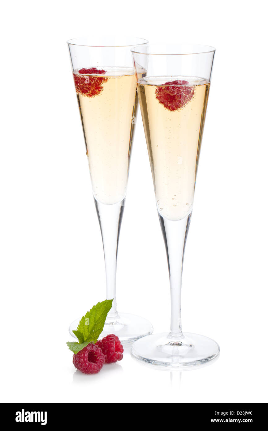 Champagne with raspberry. Isolated on white background Stock Photo - Alamy