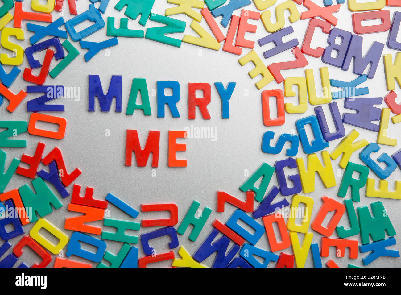 Marry refrigerator magnets spell message hi-res stock photography and ...
