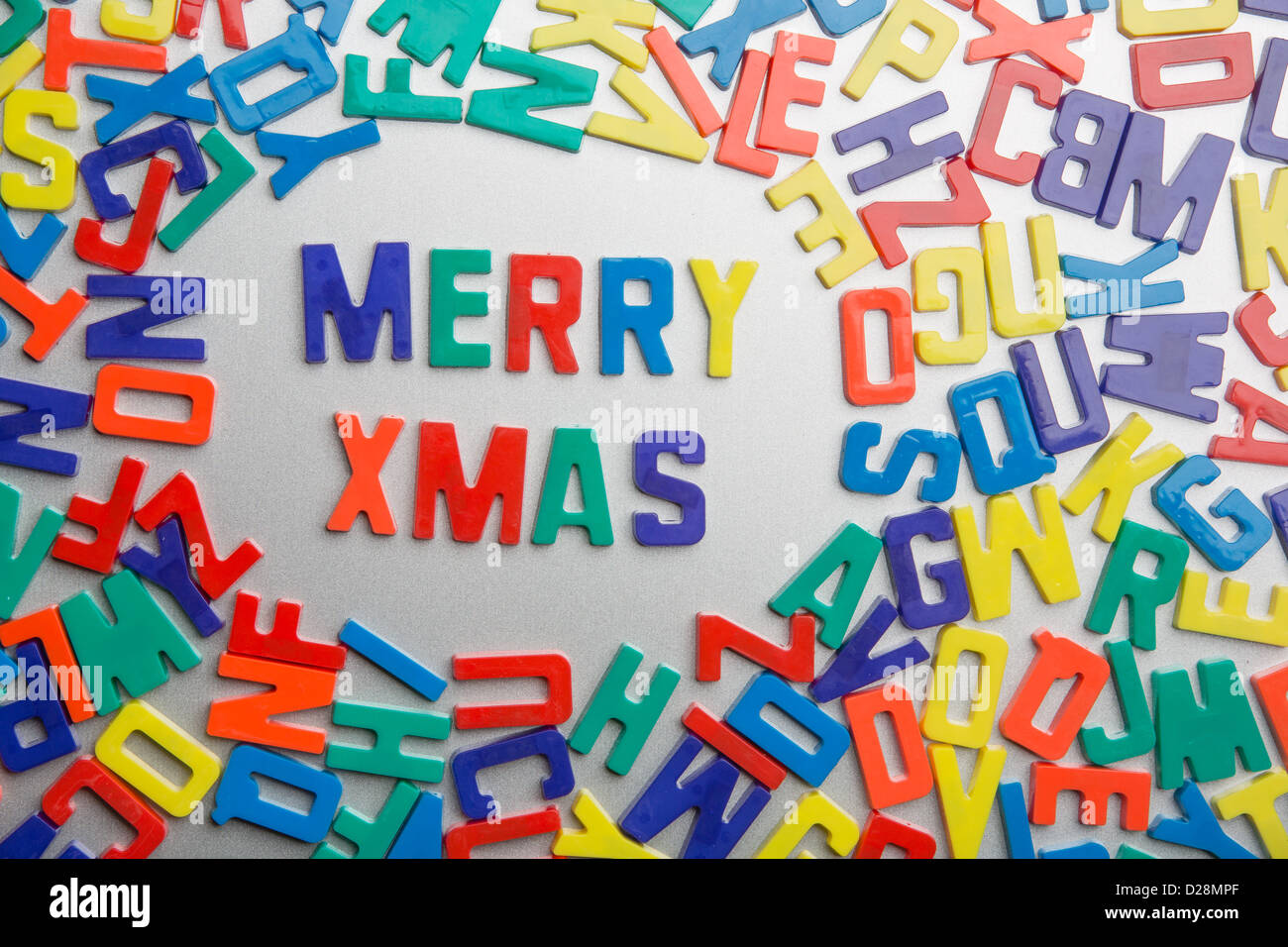 "Merry Xmas" - Refrigerator magnets spell a message out of a jumble of ...