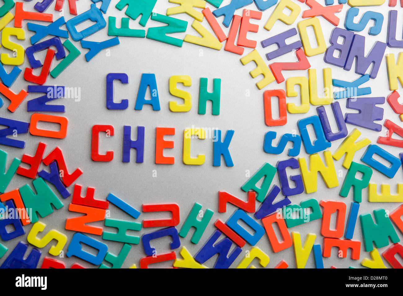 "Cash Check" - Refrigerator magnets spell a message out of a jumble of ...