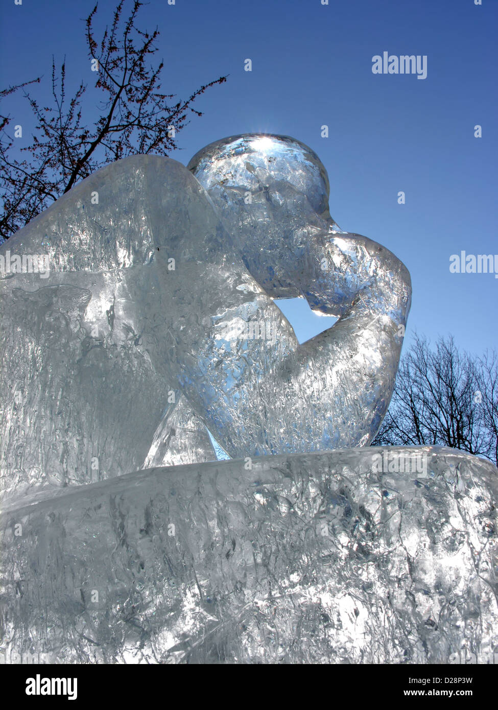 icy sculpture of sitting human, low angle view Stock Photo - Alamy