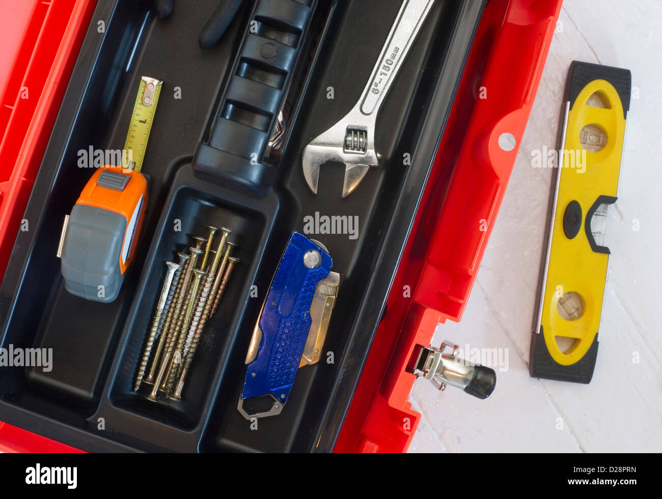 Orange Tool Box with Crescent Measuring Tape Level Boxcutter Screws and ...