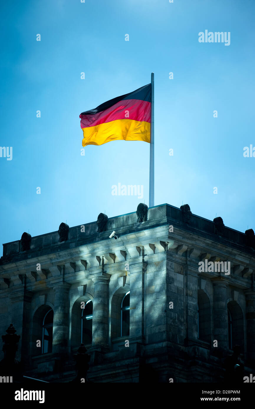 Berlin, Germany, Germany flag over the Reichstag in the evening Stock ...