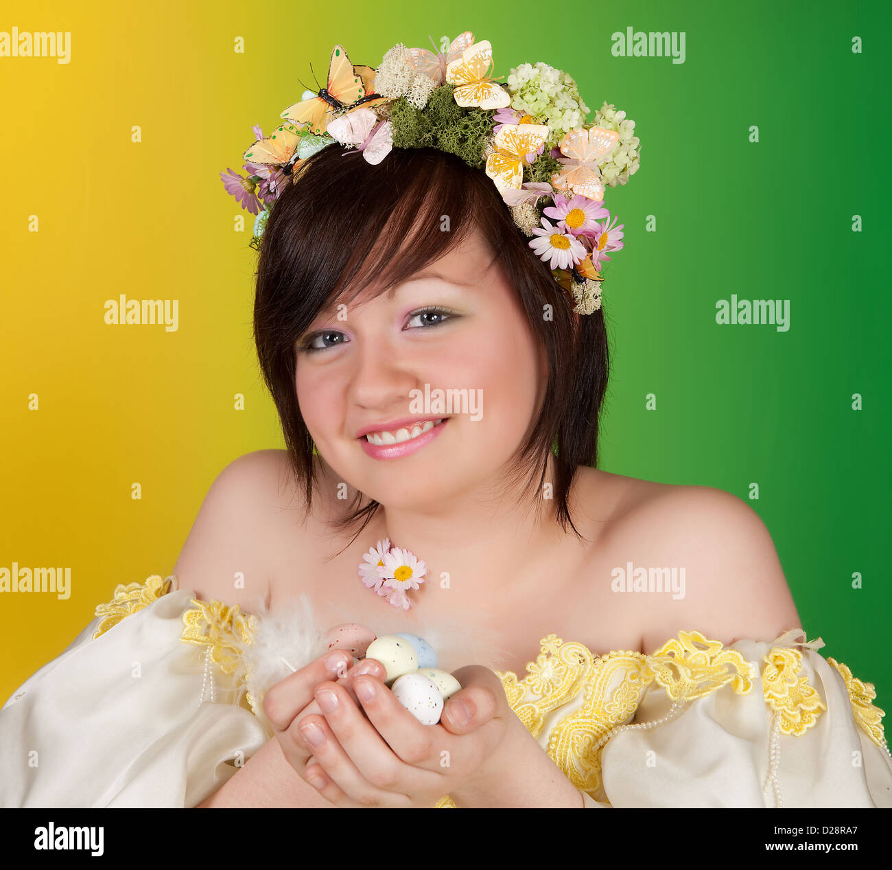 Springtime girl with butterfly and flower hair holding easter eggs in ...