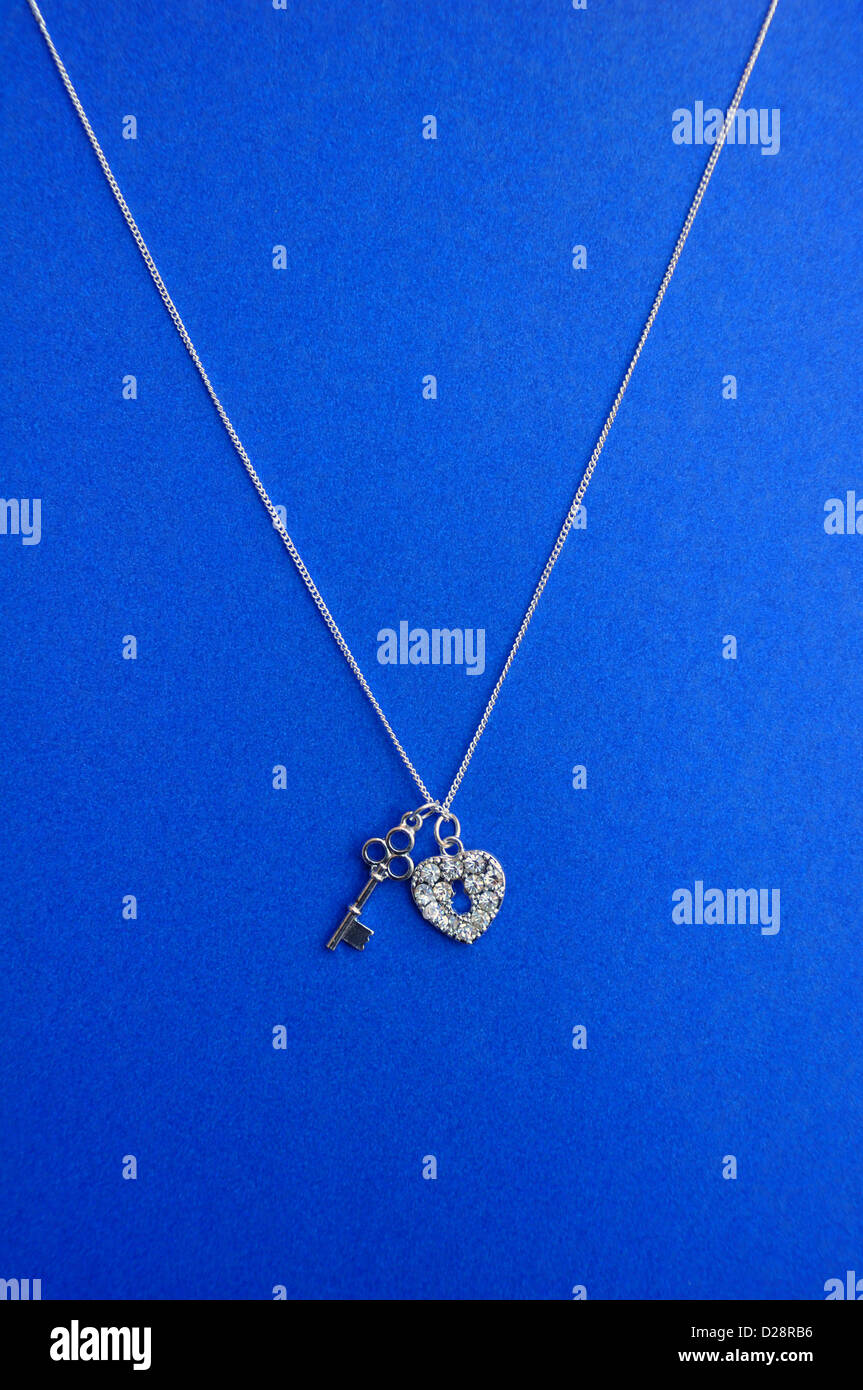 Chain and pendant - lock and key Stock Photo - Alamy