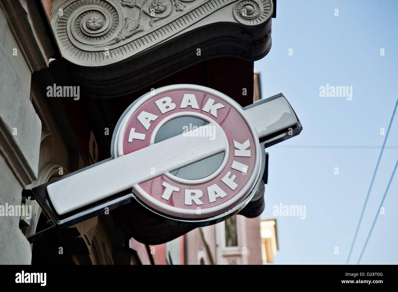 A shop sign reads 'Tabak Trafik' indicating a tobacco shop in Innsbruck ...