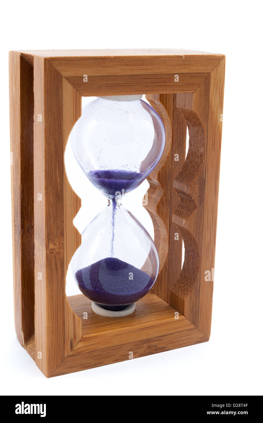 Hourglass close up view on white background Stock Photo - Alamy