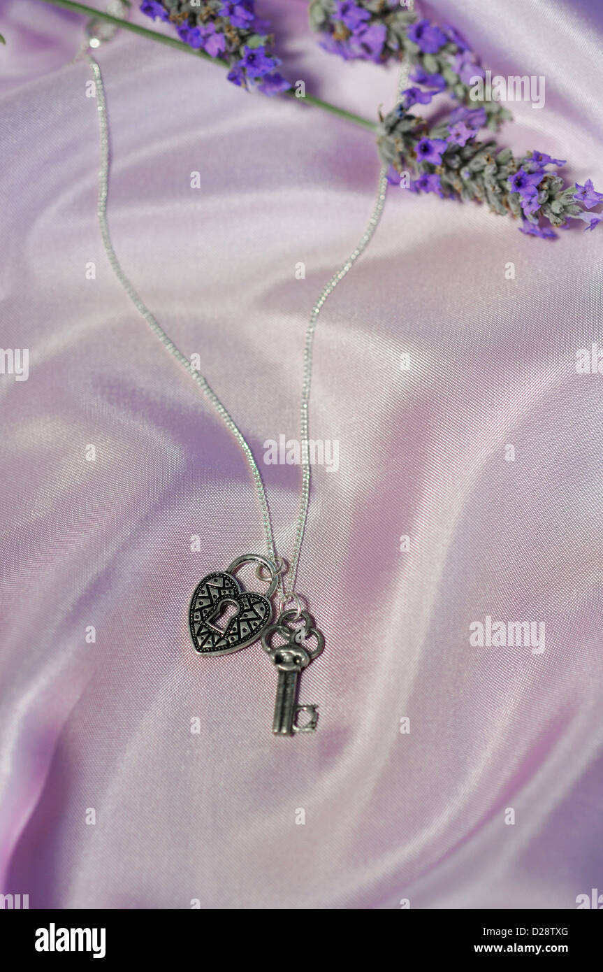 Chain and pendant - lock and key Stock Photo - Alamy