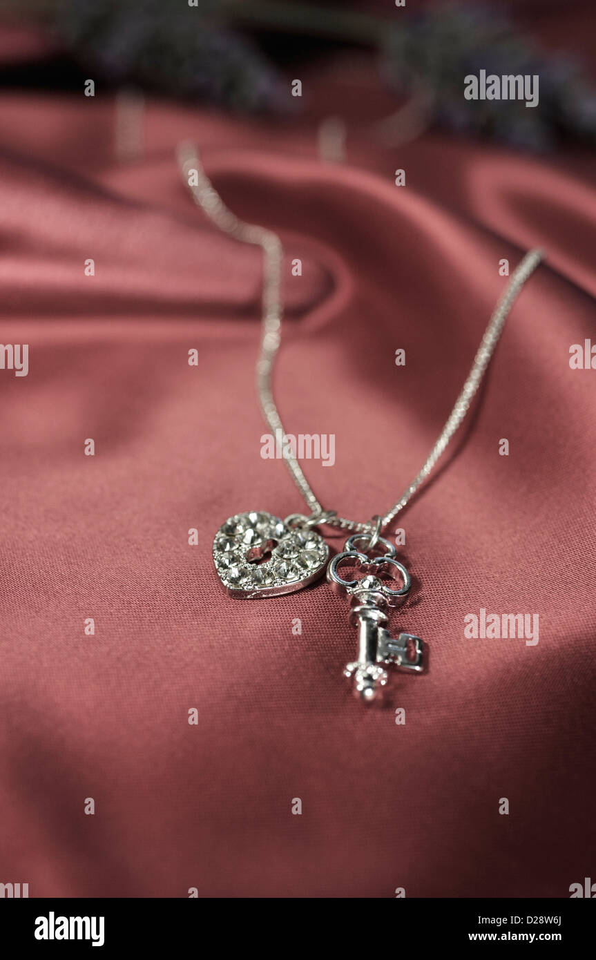 Chain and pendant - lock and key Stock Photo - Alamy