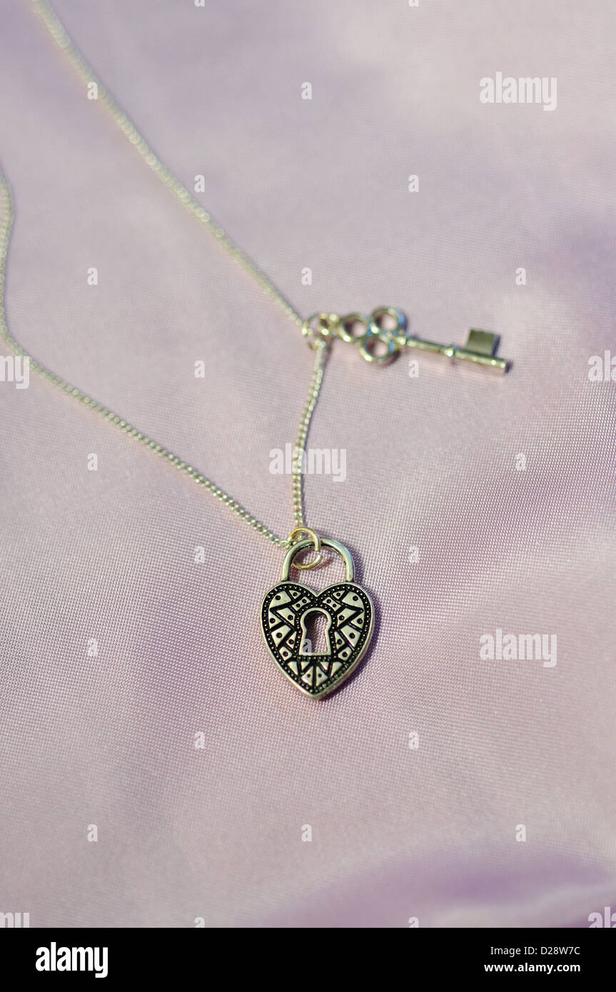 Chain and pendant - lock and key Stock Photo - Alamy