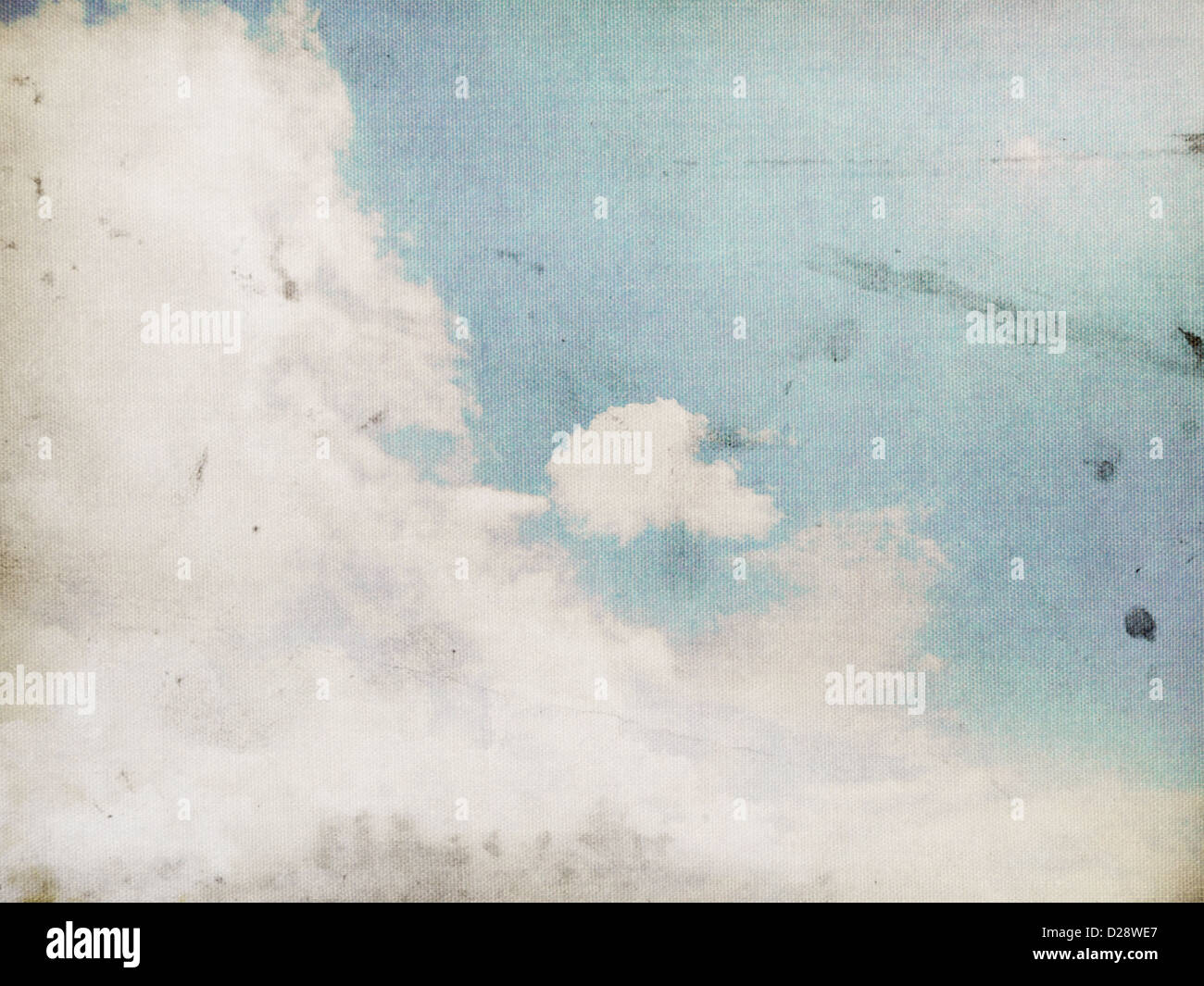 Fog and clouds on a vintage, textured paper background with a color ...