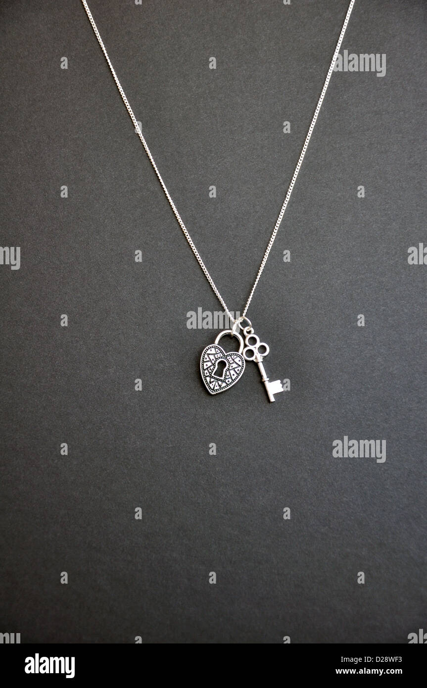 Chain and pendant - lock and key Stock Photo - Alamy